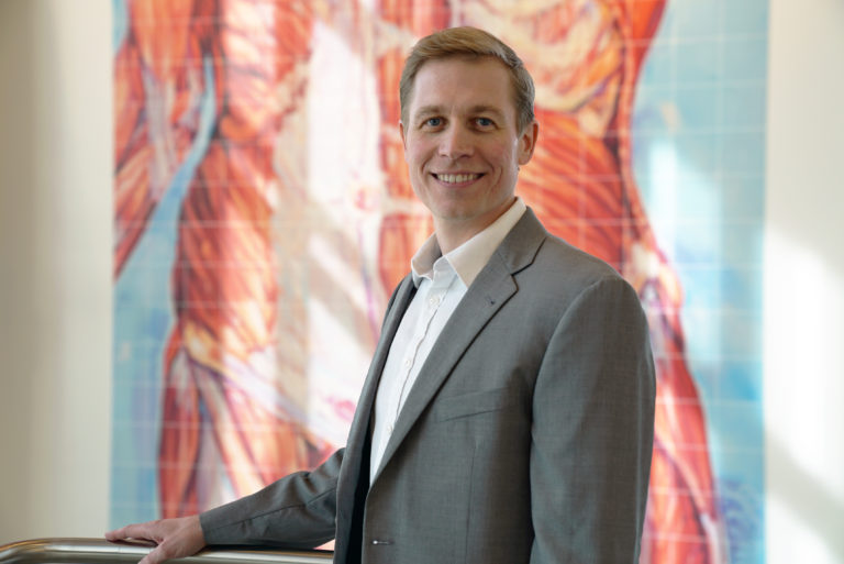 Faculty Spotlight: Dr. Dennis Rau, Jr., DO | ICOM